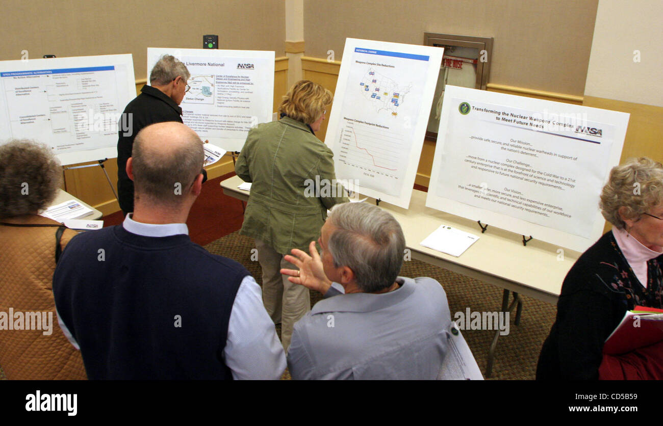 Informational posters on display at the open forum on the restructuring ...