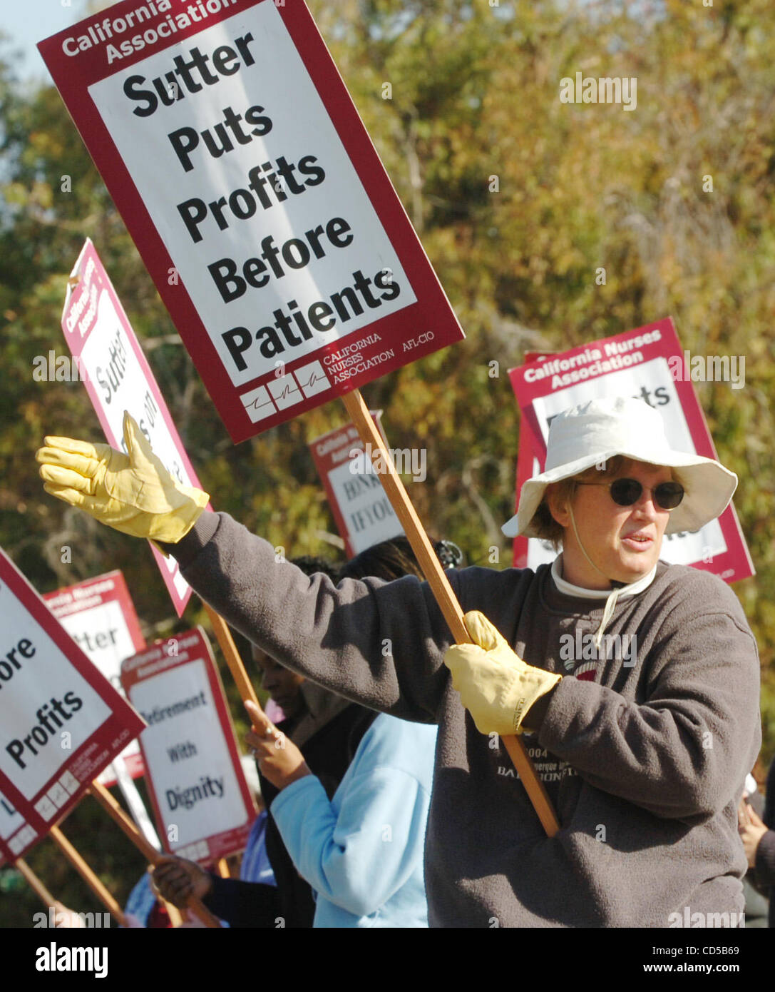 Monica Eaton, RN, of Sutter Delta Medical Center pickets with other ...