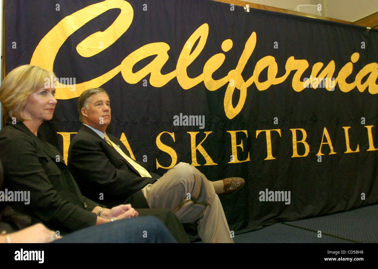 Sarah Montgomery and coach Mike Montgomery wait during the press ...