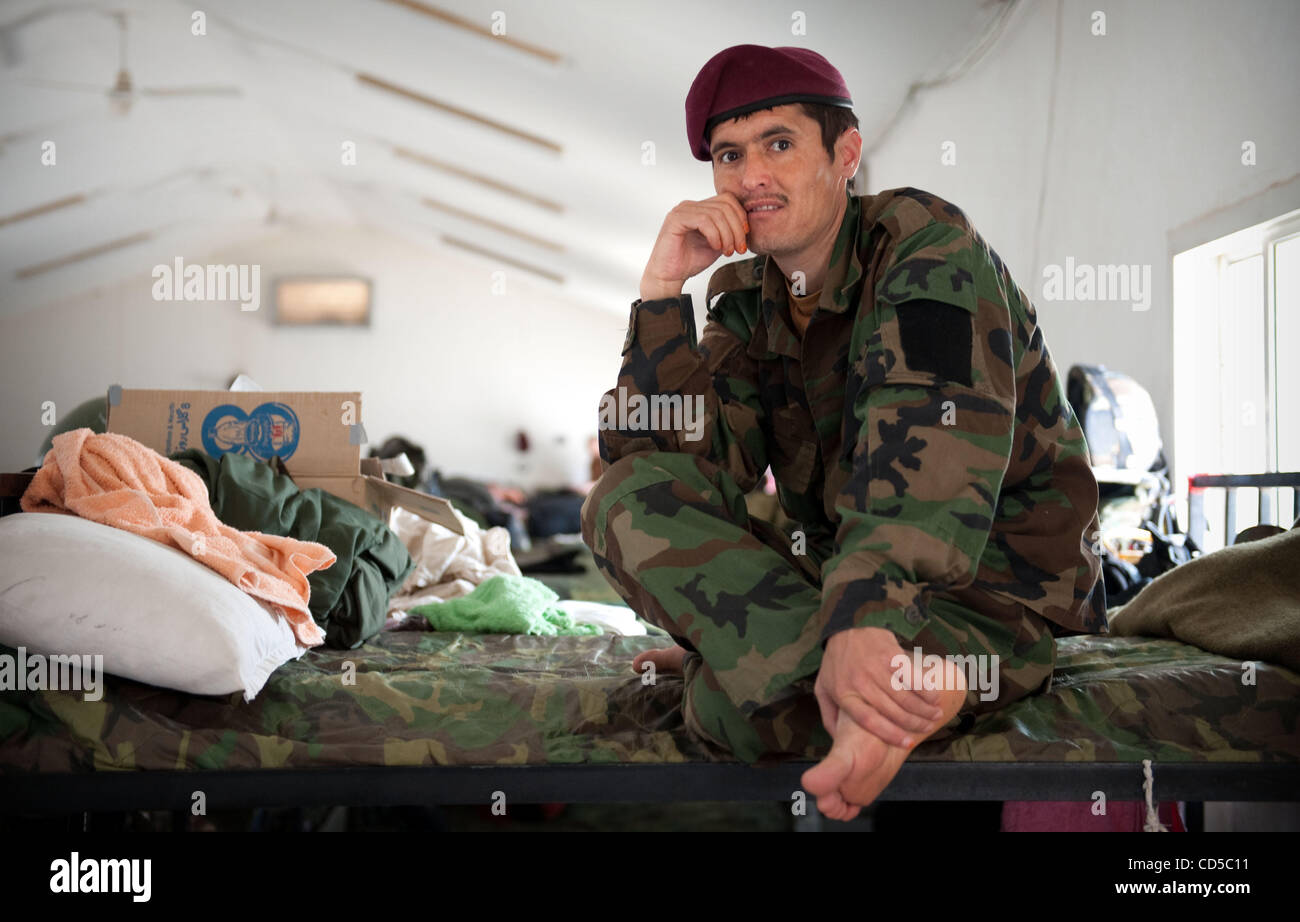 Apr 11, 2008 - Camp Hero, Afghanistan - An Afghan Commando sits on his ...