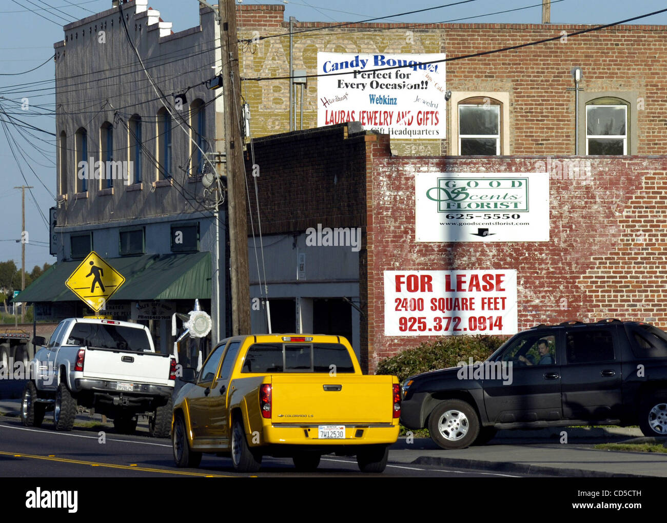 Businesses on a narrow two lane Main Street in Oakley lack safe street ...