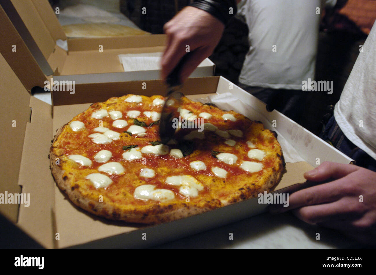 A pie at Luzzo's Pizzeria on 1st Avenue. Scott Wiener, 26, of Hoboken ...