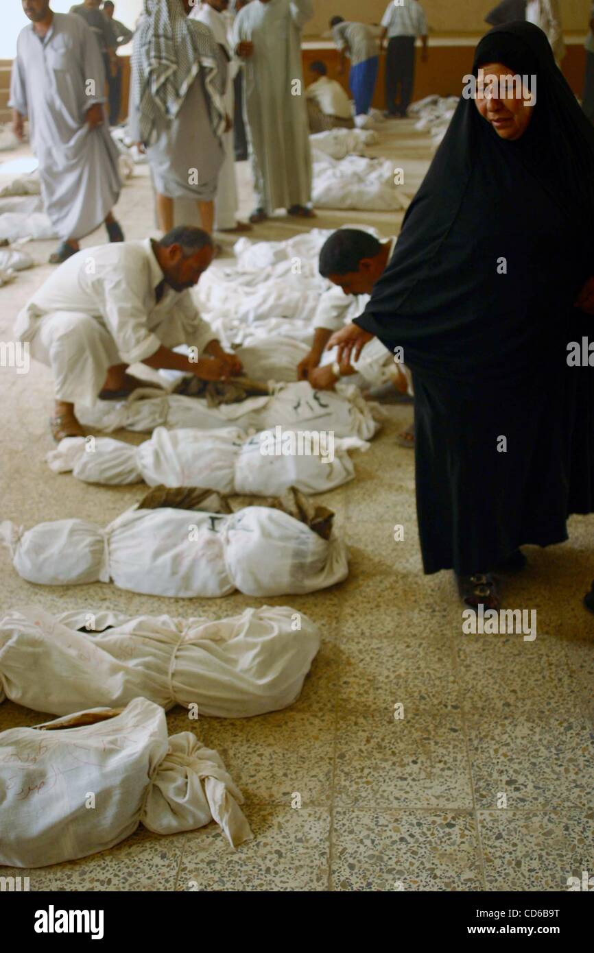 May 21, 2003 - Al-Musayab, Iraq - Bones in shrouds fill the gymnasium ...