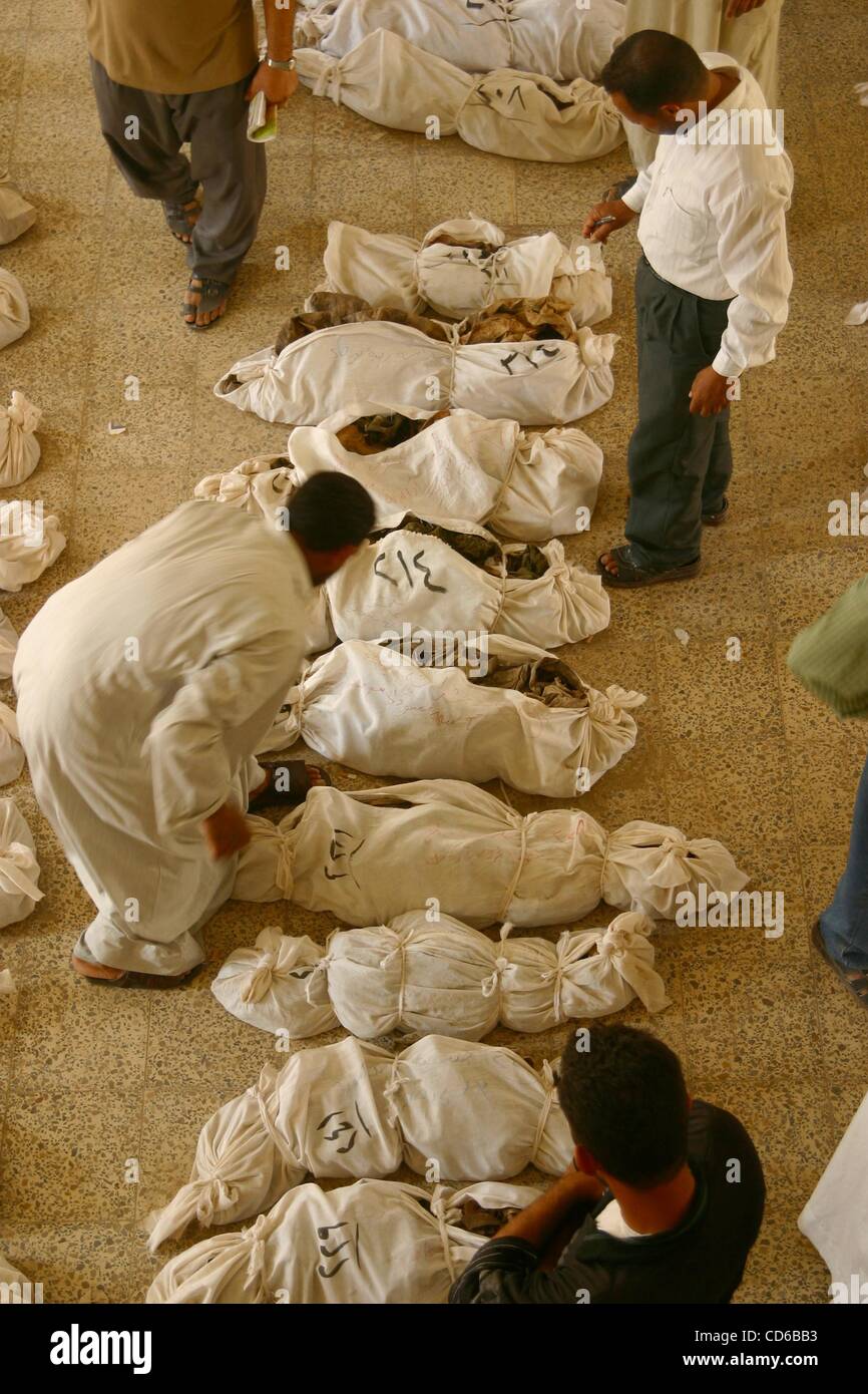 May 24, 2003 - Al-Musayab, Iraq - Bones in shrouds fill the gymnasium ...