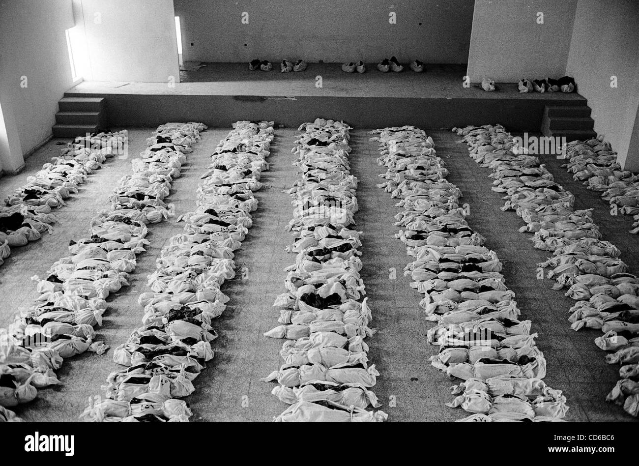 May 24, 2003 - Al-Musayab, Iraq - Bones in shrouds fill the gymnasium ...