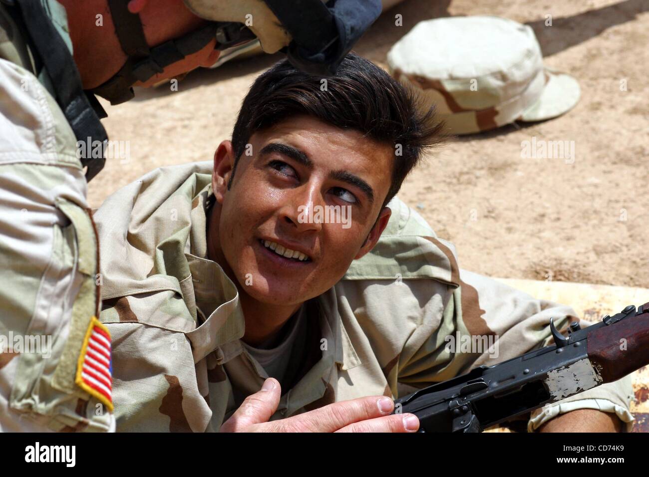 May 18, 2004 - Qayarrah, Iraq - ICDC soldiers in training learn how to ...