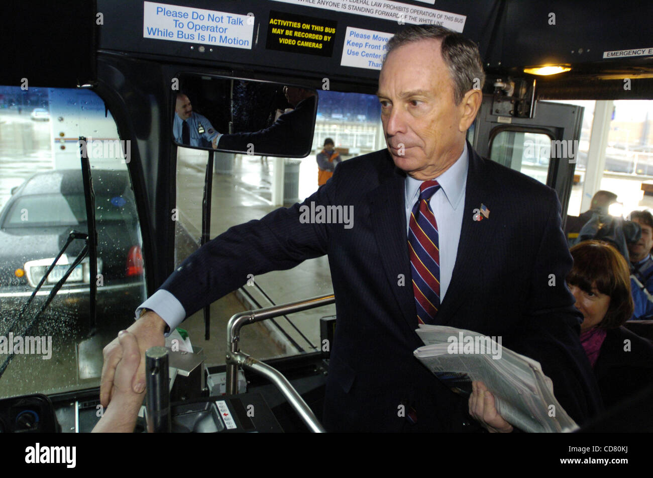 Mayor Michael Bloomberg shakes hands with bus driver Nick Ferrando as ...