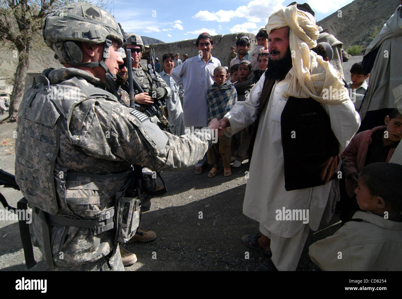 080405-7348 Meeting village elder Headline: US Patrol in Eastern ...
