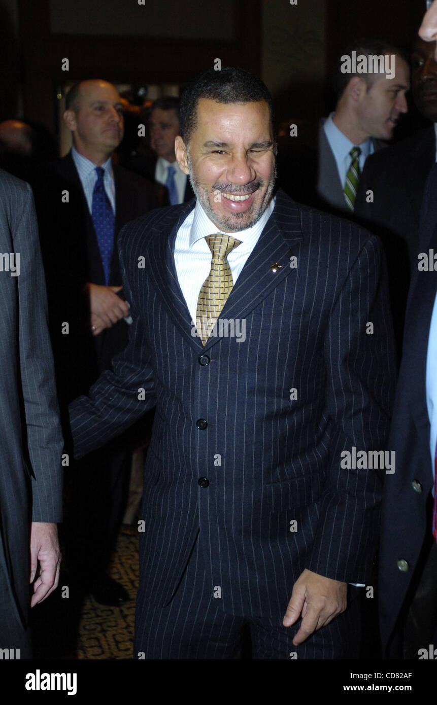 Governor David Paterson is greeted while arriving to address members of ...
