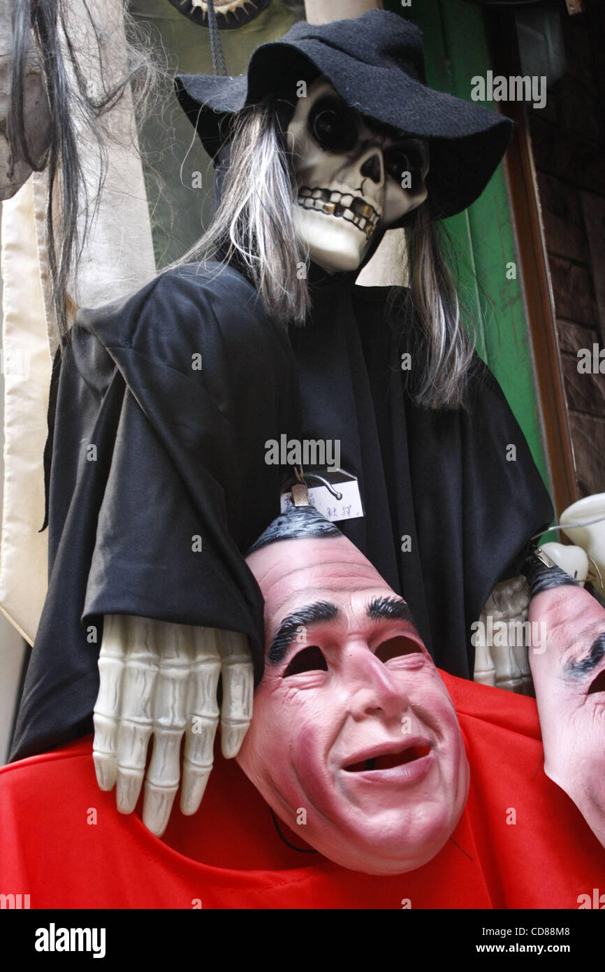 Oct 02, 2008 - Nanjing, China - A George W. Bush mask sits beneath a ...