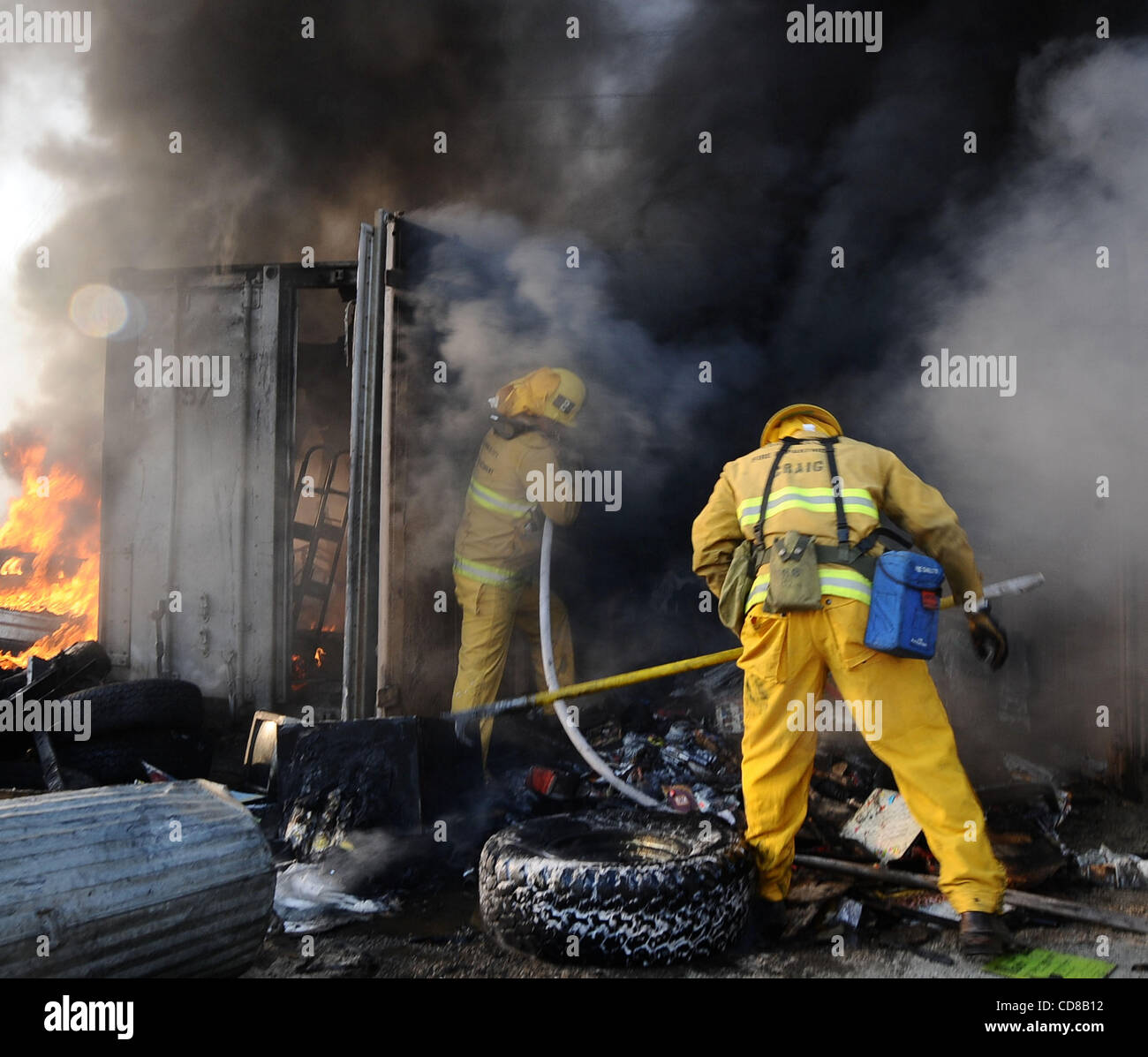 Firefighters battle a fire storm during the second day of the Marek a ...
