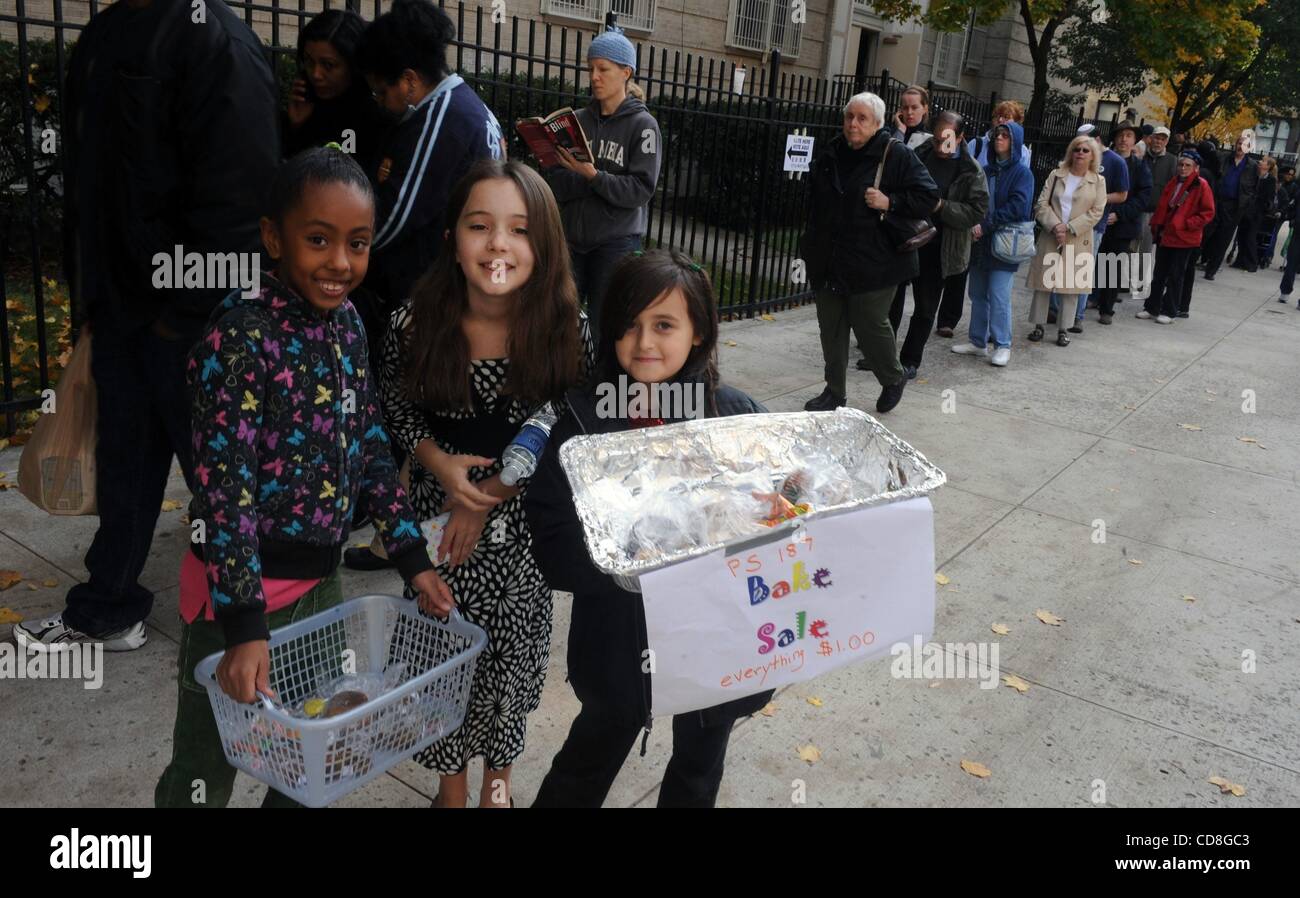 Jasmine (L), Caroline (C), and Jaya (R) sell baked goods and fruit as ...