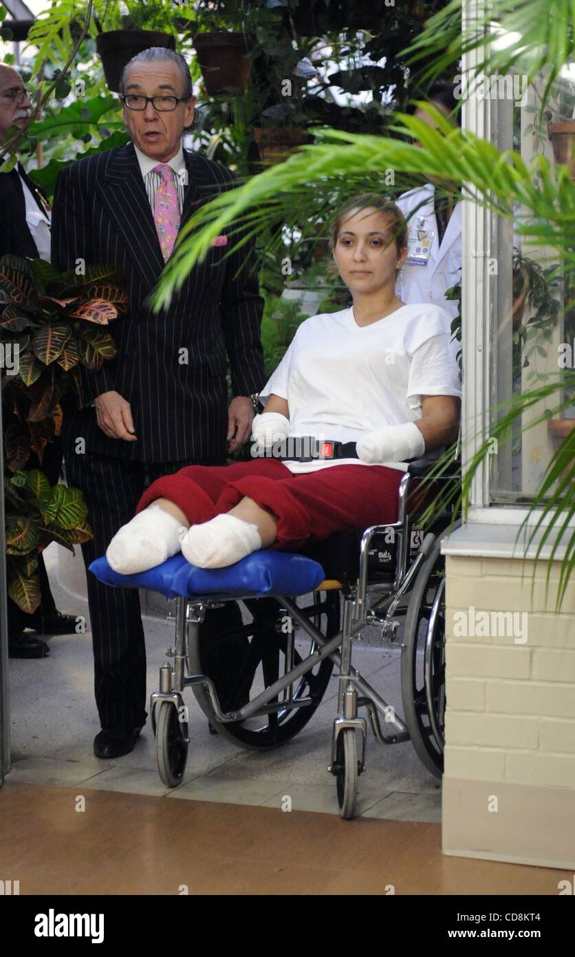 Nov 21, 2008 - Manhattan, New York, USA - TABITHA MULLINGS, 32, holds a ...