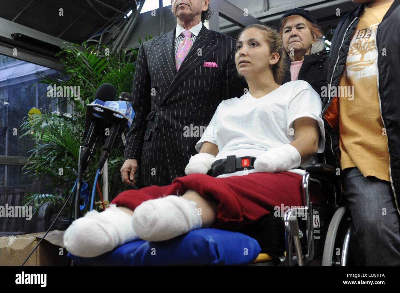 Nov 21, 2008 - Manhattan, New York, USA - TABITHA MULLINGS, 32, holds a ...