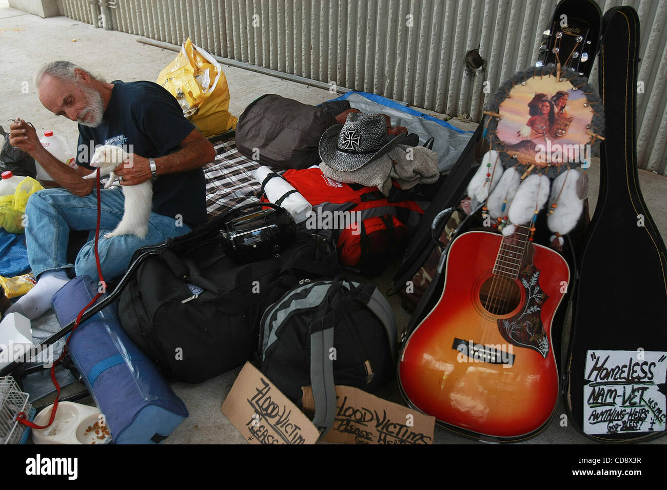 June 10, 2010 - Nashville, TN, USA - Homeless man Cowboy and pet ferret ...
