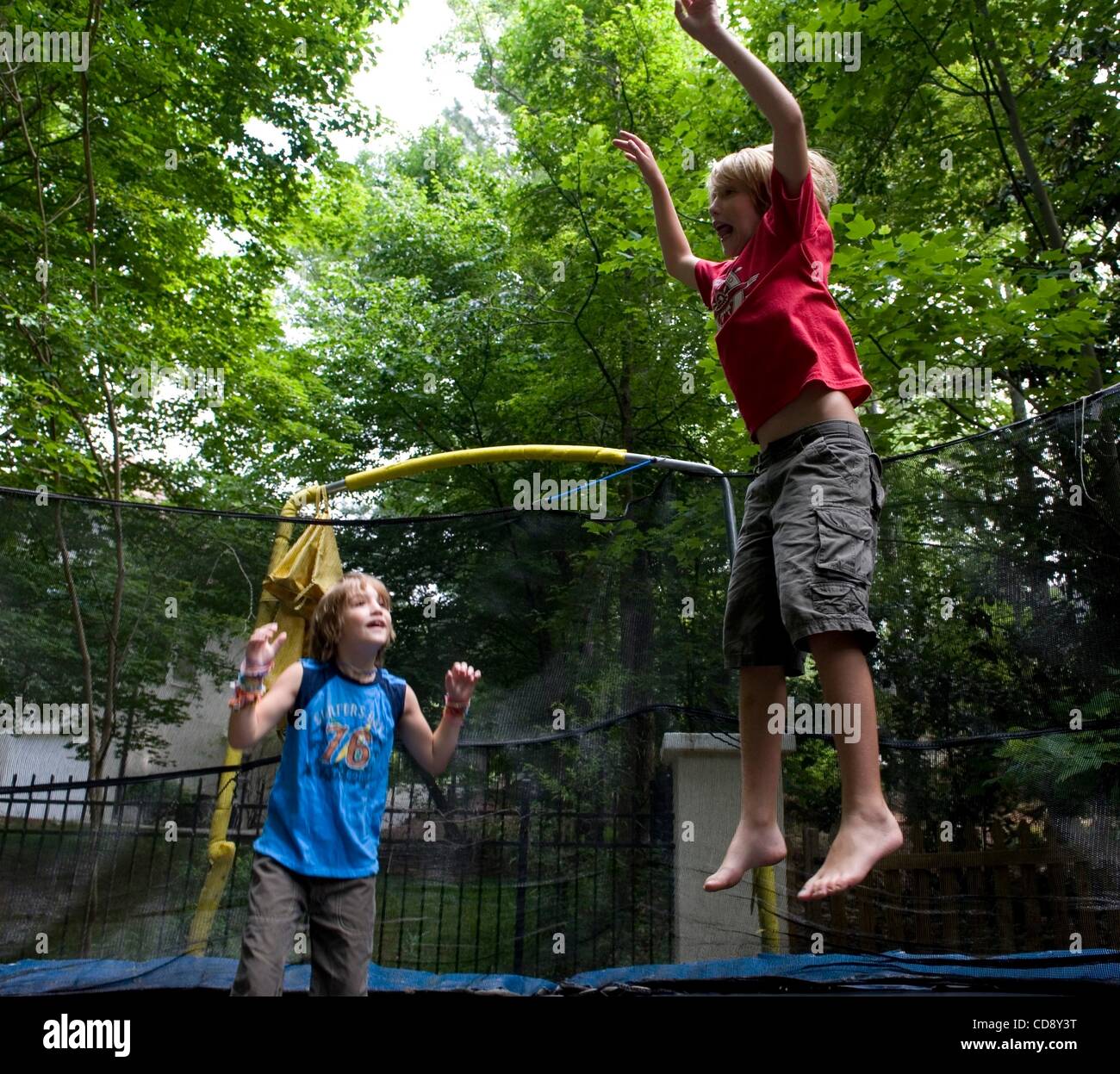 Jun 12, 2010 - Roswell, Georgia, U.S. - GAVIN BAKER, red shirt, 11, and ...