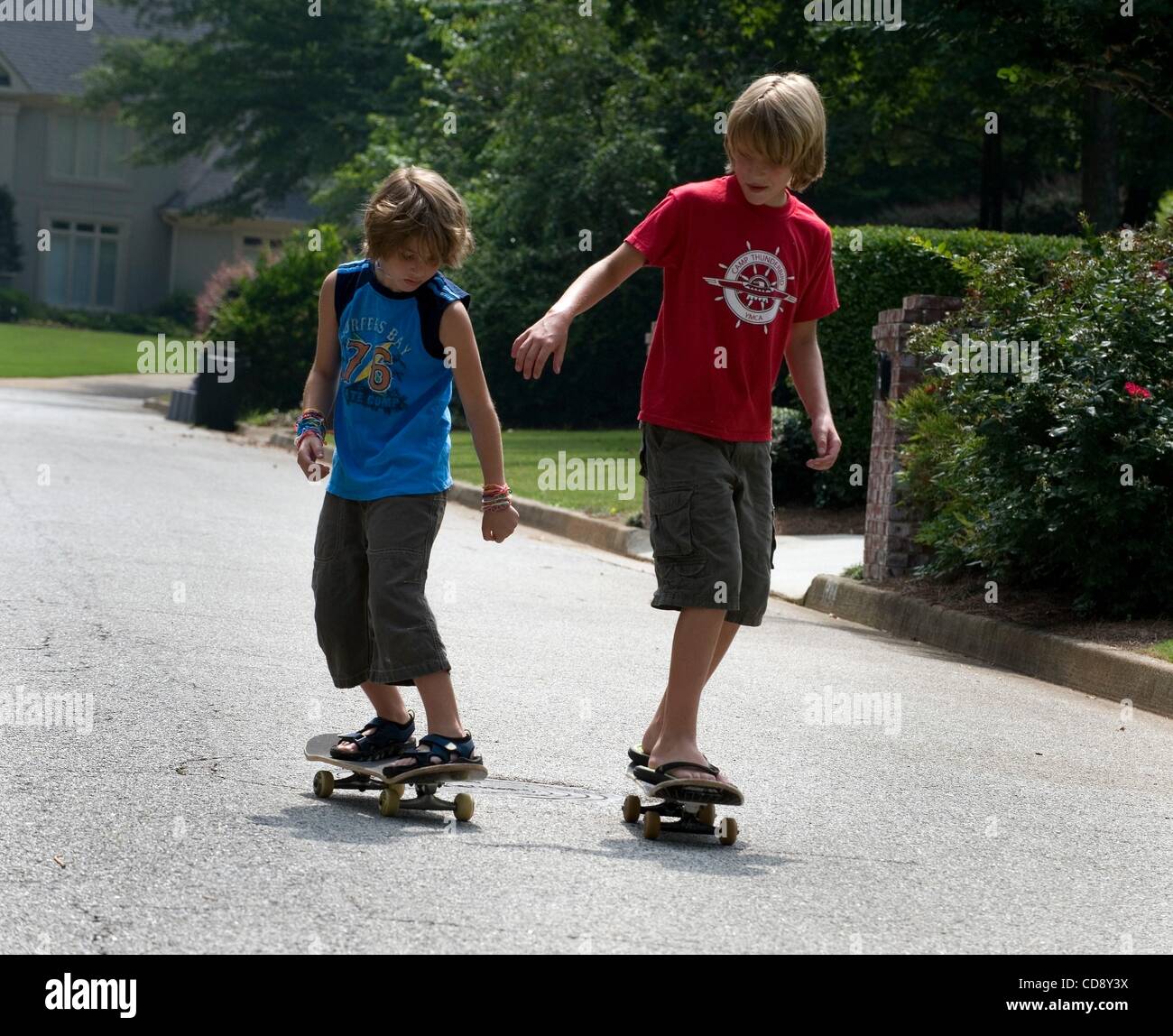 Jun 12, 2010 - Roswell, Georgia, U.S. - GAVIN BAKER, red shirt, 11, and ...