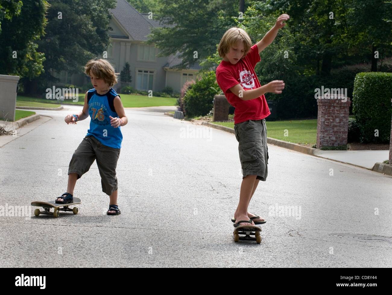 Jun 12, 2010 - Roswell, Georgia, U.S. - GAVIN BAKER, red shirt, 11, and ...