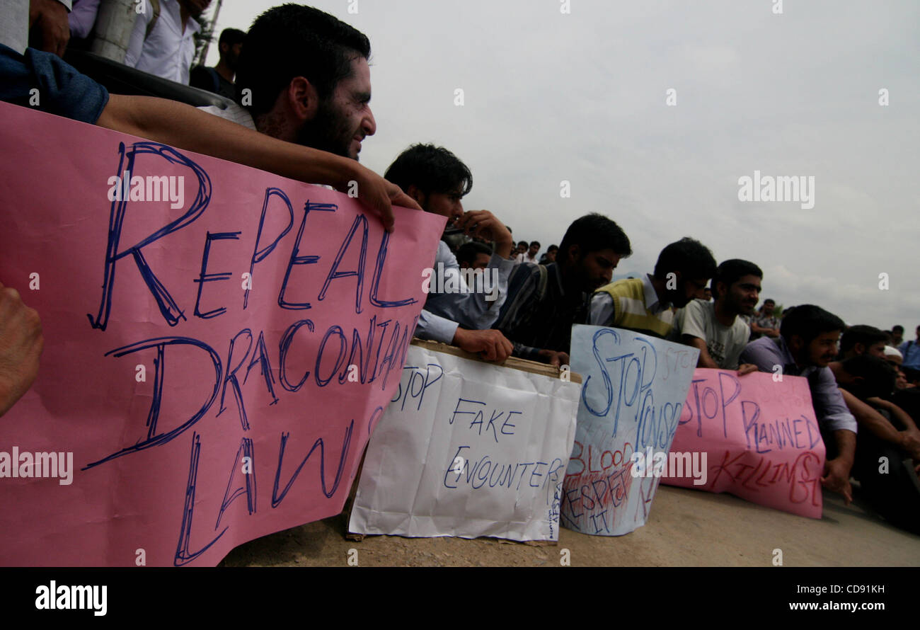 kashmiri muslim students hold ply cards during protest against killing ...