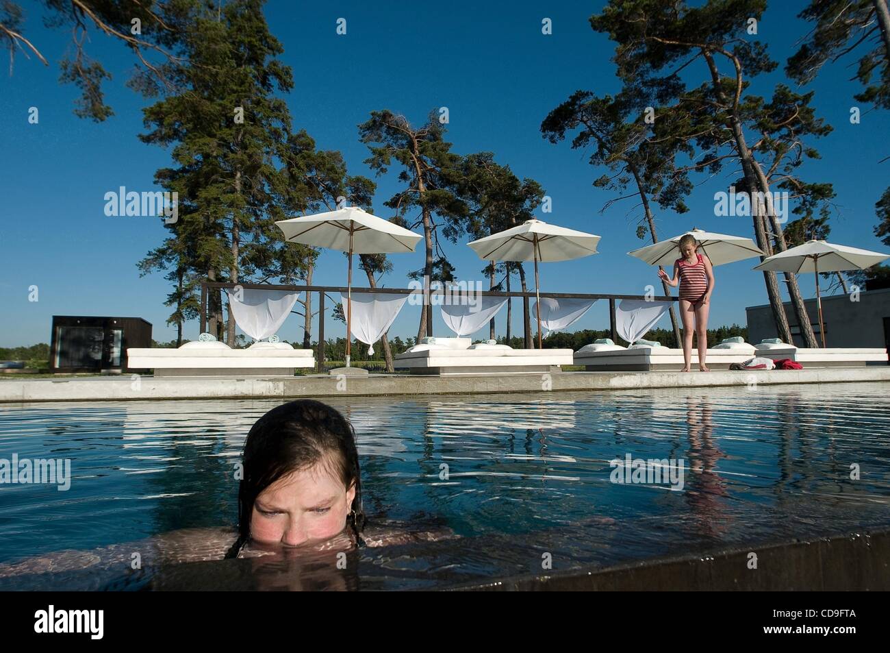 Jul 09, 2010 - Visby, Gotland, Sweden - A woman enjoys the pool at the ...