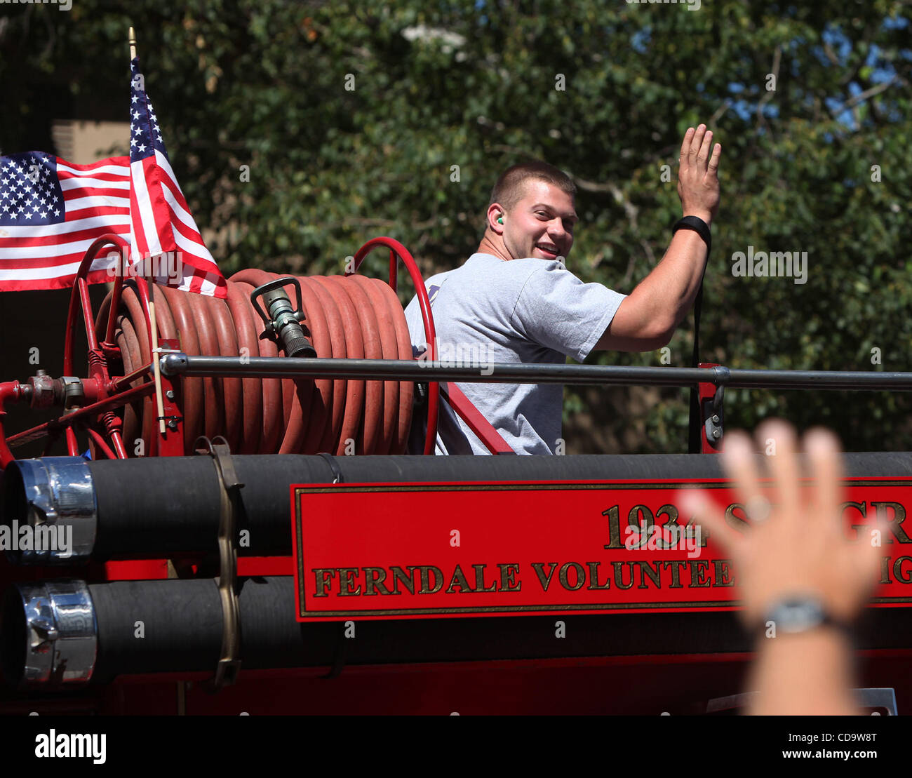 Jake Locker waves to a crowd at the Old Settlers Parade in Ferndale as ...