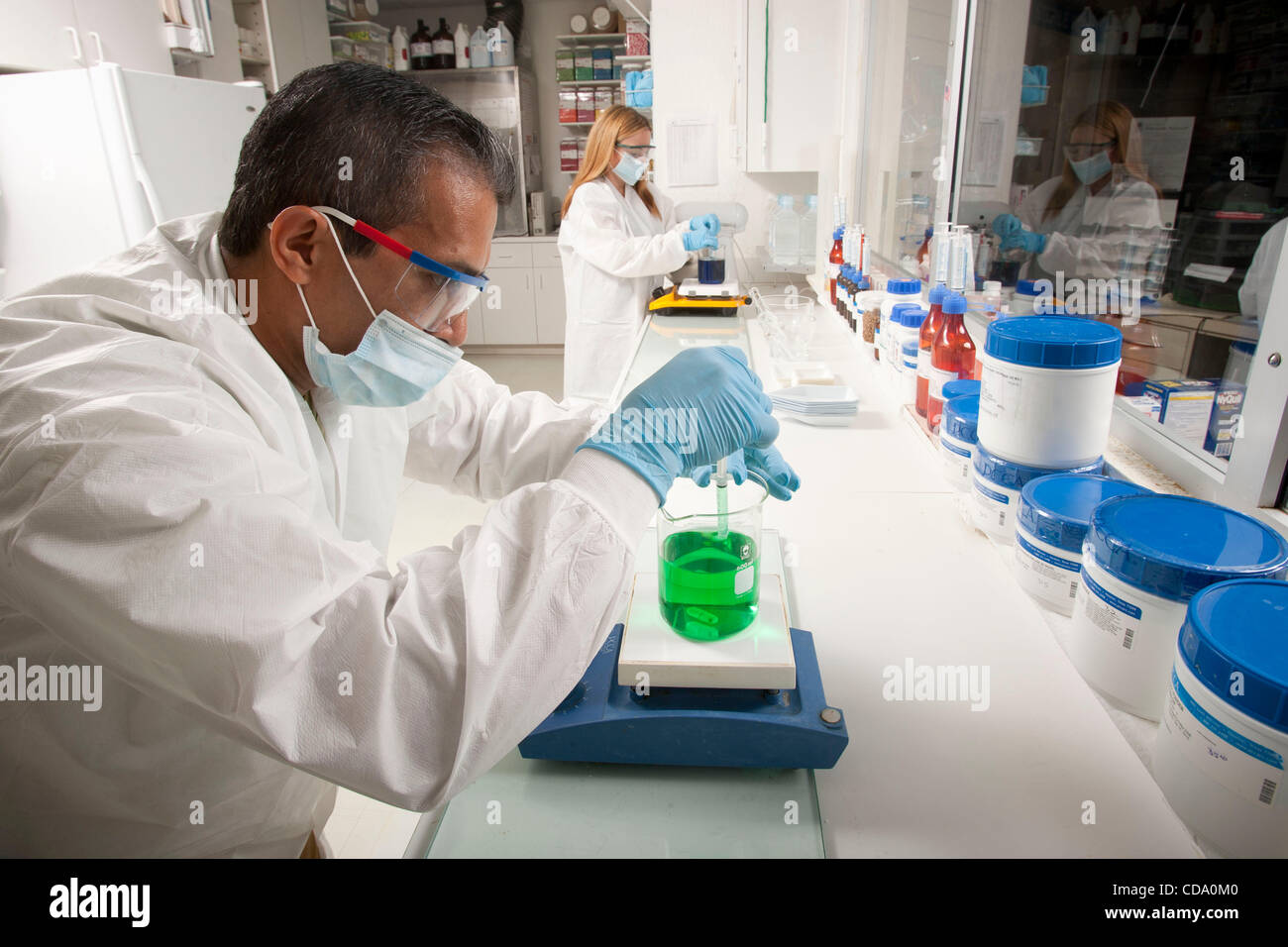 July 29, 2010 - Hollywood, Florida, US - Pharmacists' make a custom ...