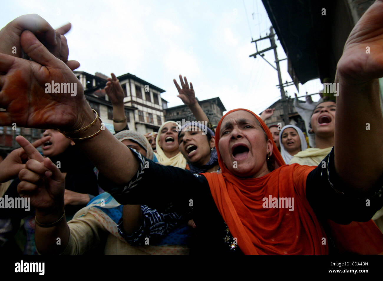 Kashmiri muslim women crying during the funeral procession of Ghulam ...