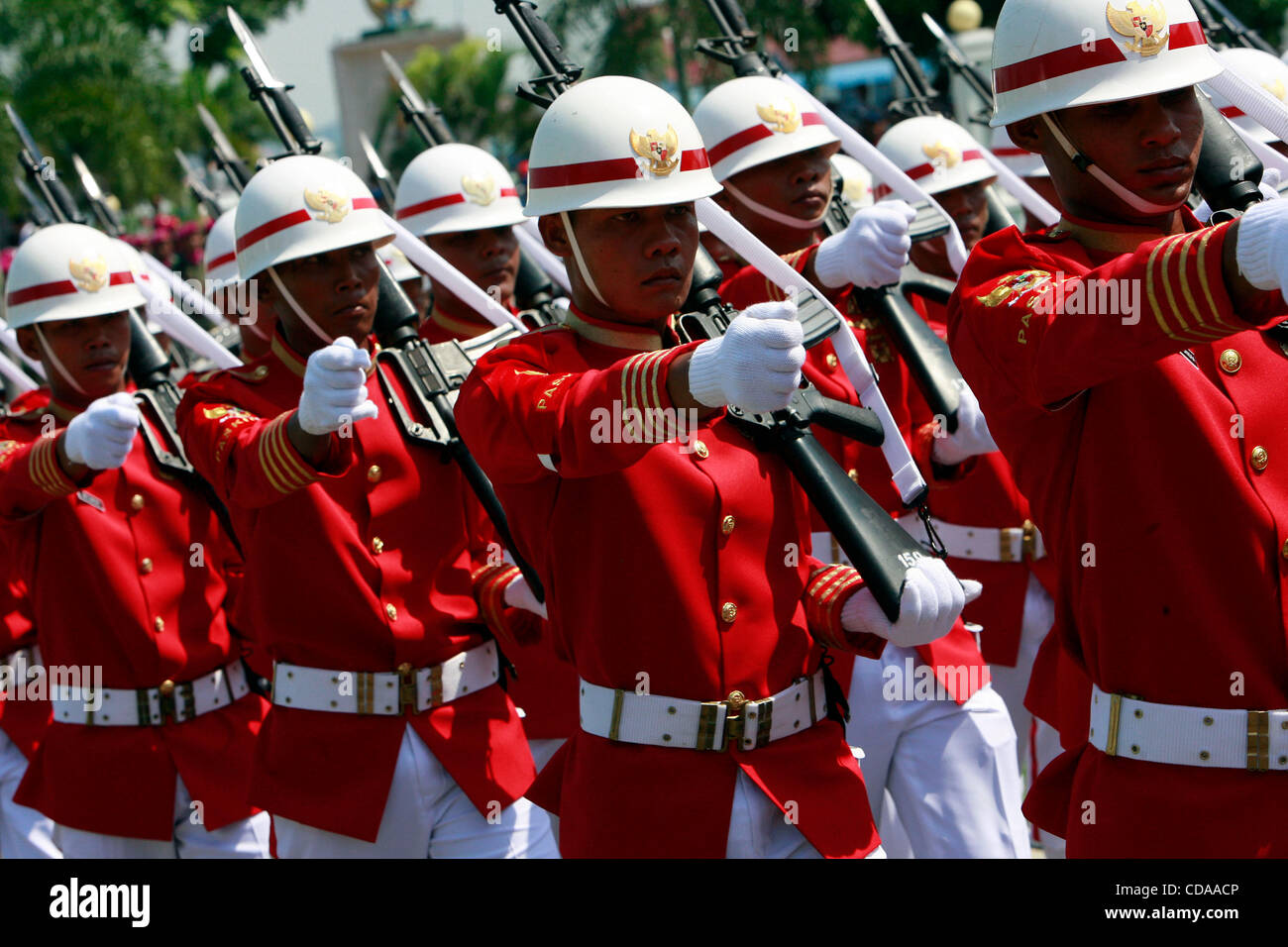 A group of honour guards from national flag group during a flag raising ...
