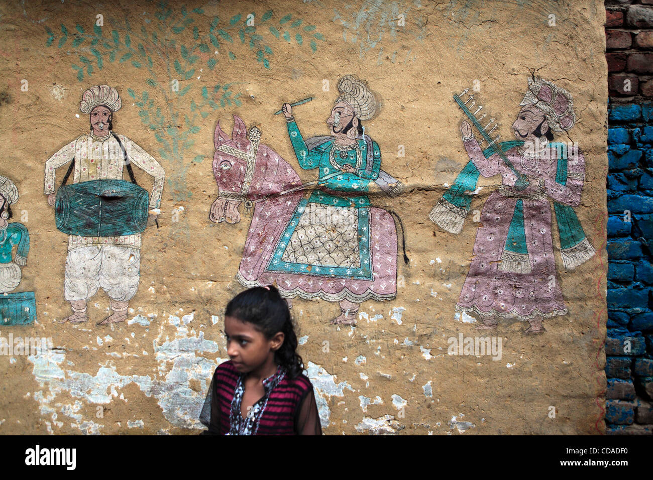 Traditional Drawings of Artists performing on a wall at Kathputli ...