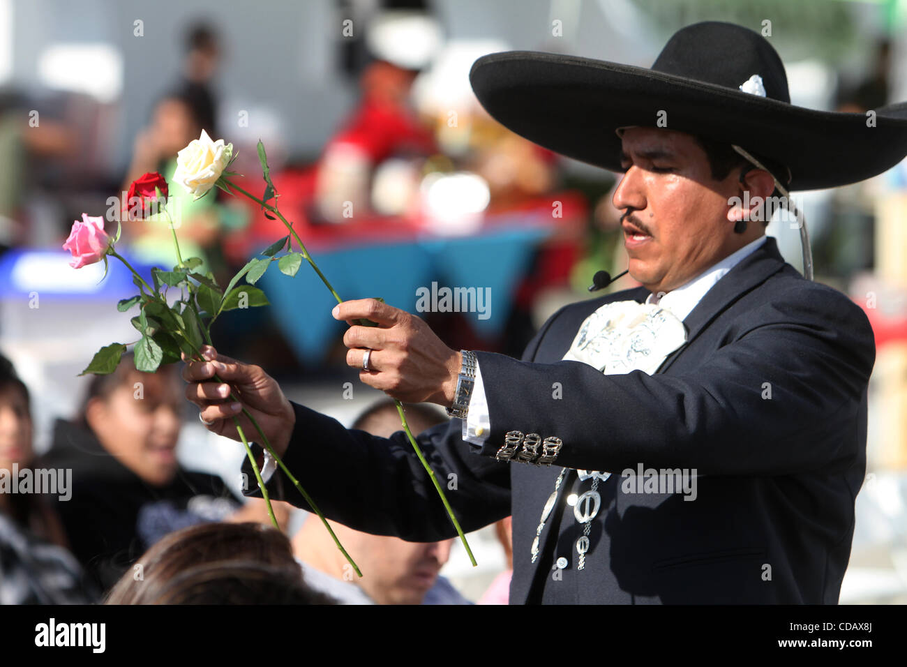 Sept. 16, 2010 - Mexican singer Jorge Estrada hands out roses to ladies ...