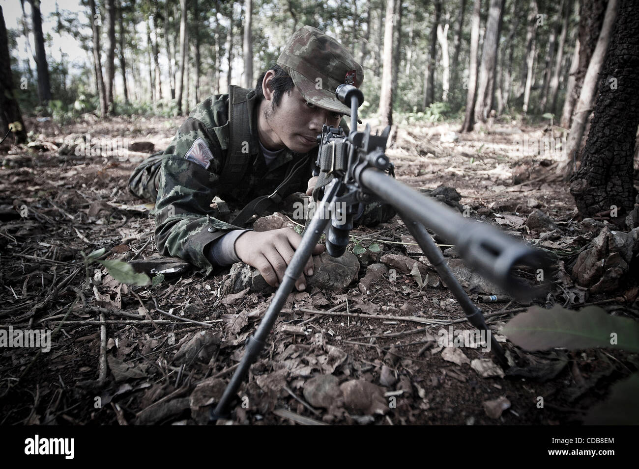 Soldier of Battalion 101 of the Karen rebel army KNLA maintains his ...