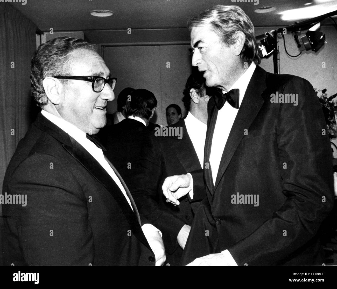 HENRY KISSINGER AND GREGORY PECK BACKSTAGE AT THE NEW YORK PHILHARMONIC ...
