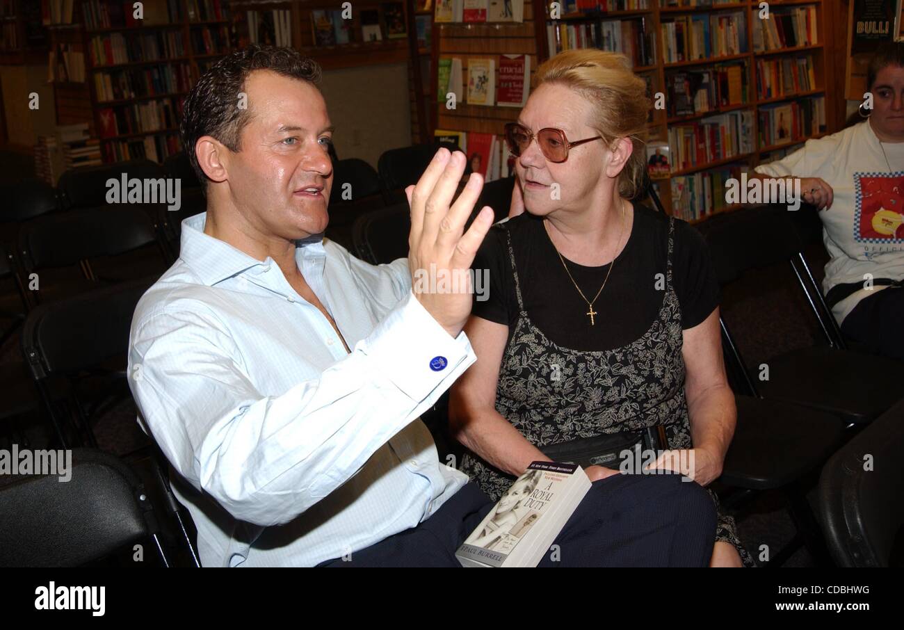 K37772AR.PAUL BURRELL SIGNS COPIES OF HIS BOOK ''ROYAL DUTY'' AT ...