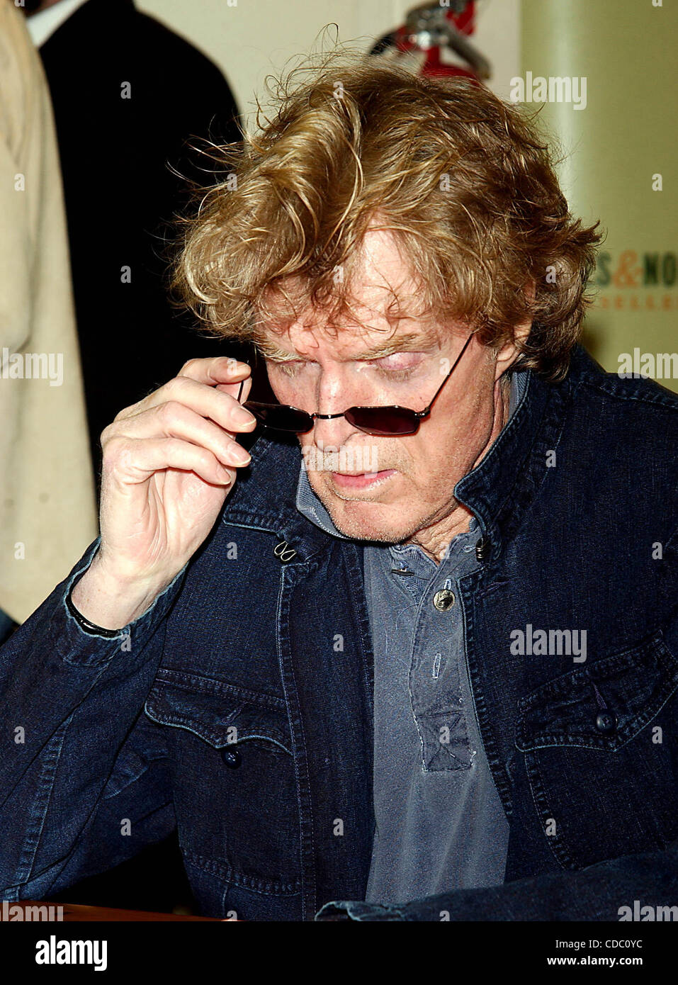 K36889AR.DON IMUS AND WIFE DEIDRE SIGN'S COPIES OF ''THE IMUS RANCH ...