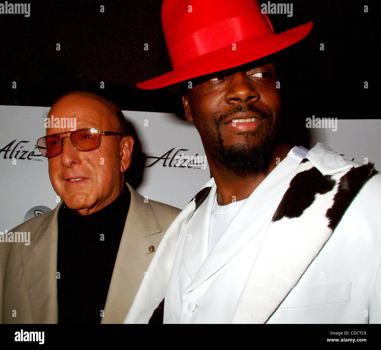 K32918ML .WYCLEF JEAN AND CLIVE DAVIS HOST THE PREACHER'S SON UNVEILING ...