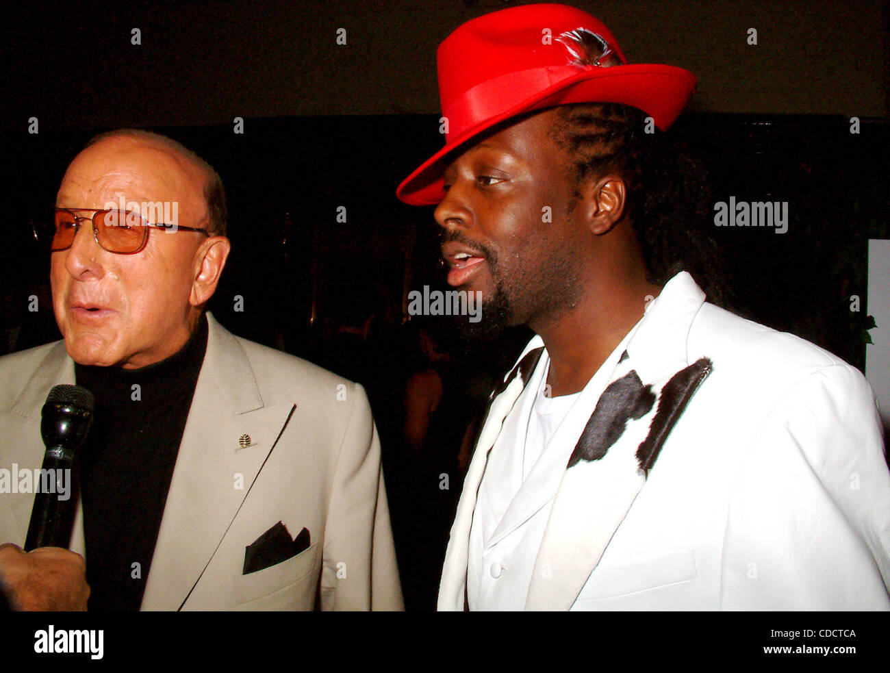 K32918ML .WYCLEF JEAN AND CLIVE DAVIS HOST THE PREACHER'S SON UNVEILING ...