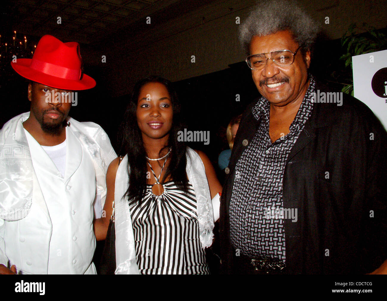 K32918ML .WYCLEF JEAN AND CLIVE DAVIS HOST THE PREACHER'S SON UNVEILING ...