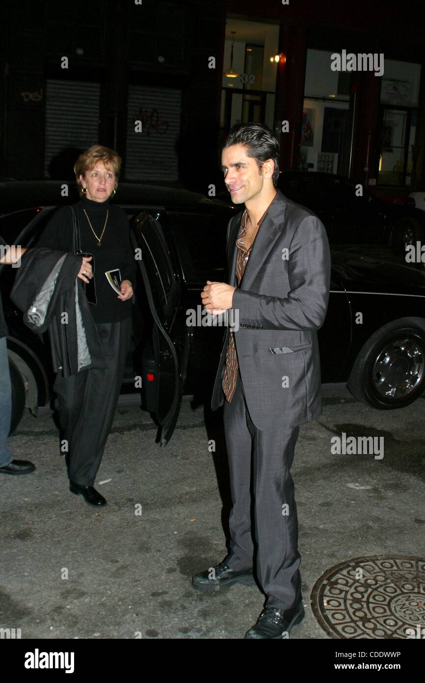 Jan. 1, 2011 - New York, New York, U.S. - JOHN STAMOS AND HIS MOTHER ...