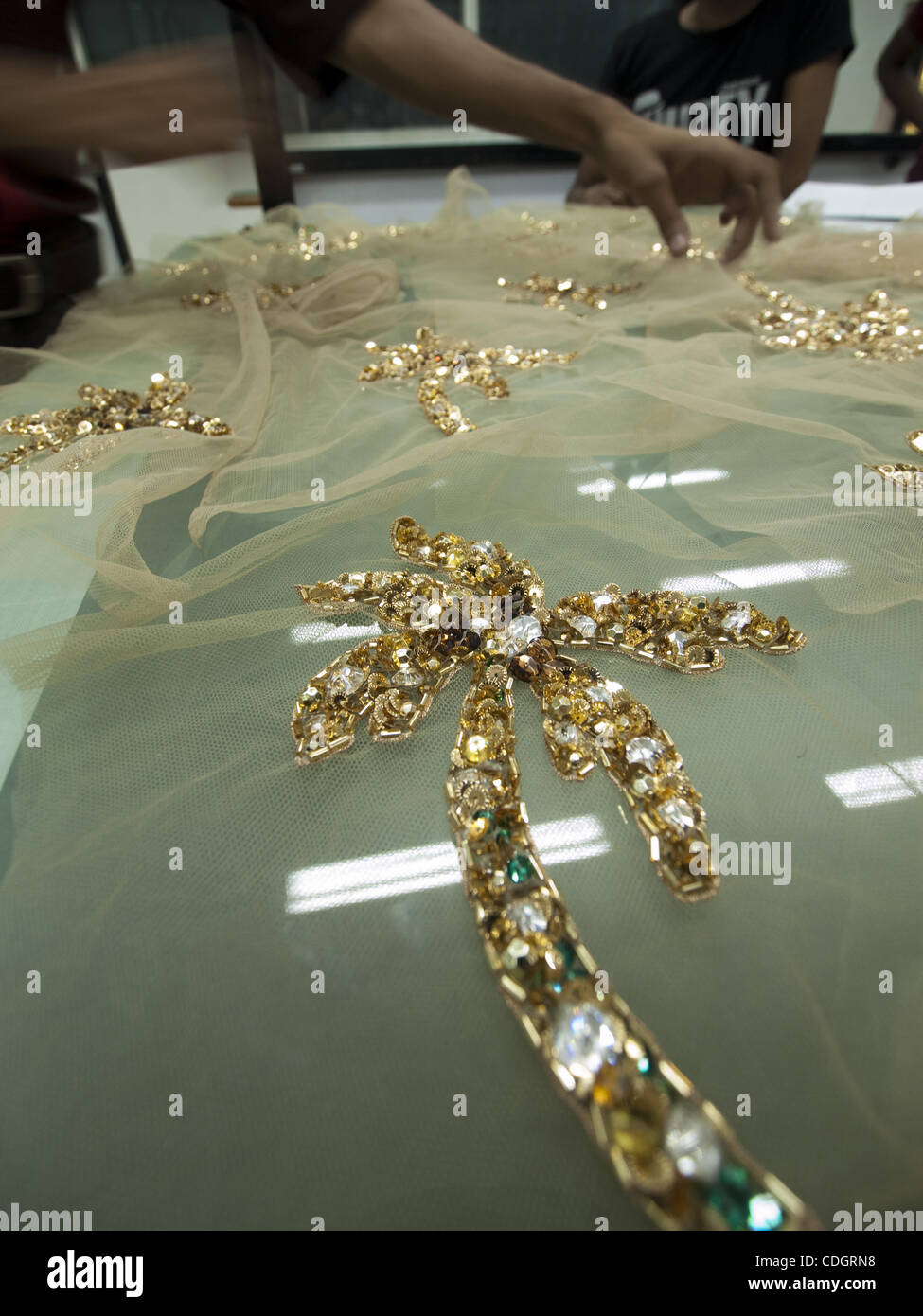 Jan. 19, 2011 - Mumbai, Maharashtra, India - Gold palm tree embroidery ...