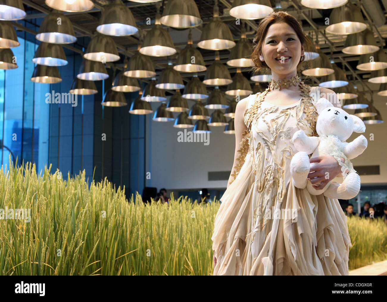 Jan. 22, 2011 - Tokyo, Japan - A model displays the creation designed ...