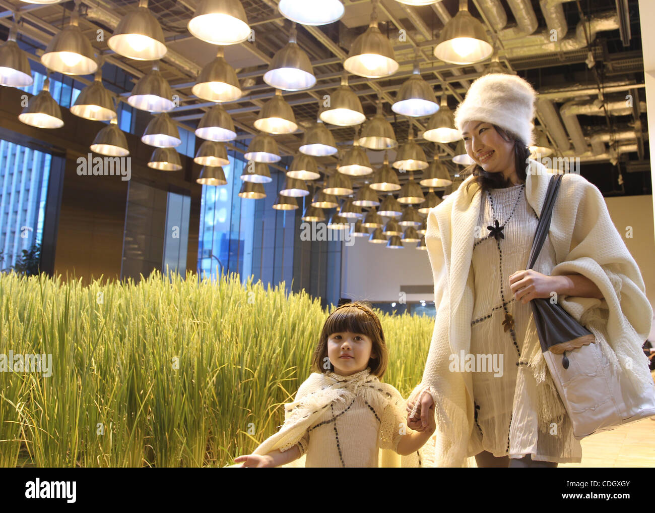 Jan. 22, 2011 - Tokyo, Japan - Models display the creation designed by ...