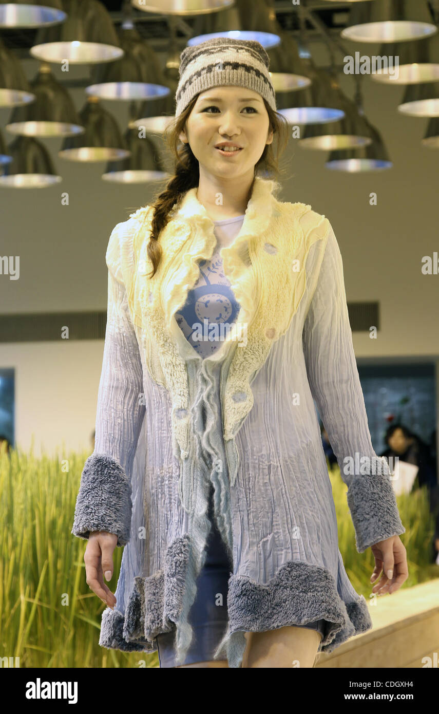 Jan. 22, 2011 - Tokyo, Japan - Model displays the creation designed by ...