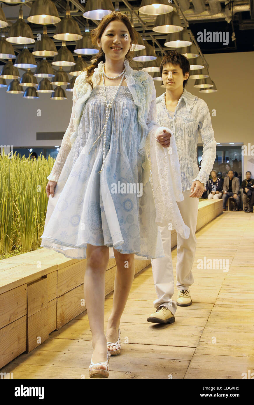 Jan. 22, 2011 - Tokyo, Japan - Models display the creation designed by ...