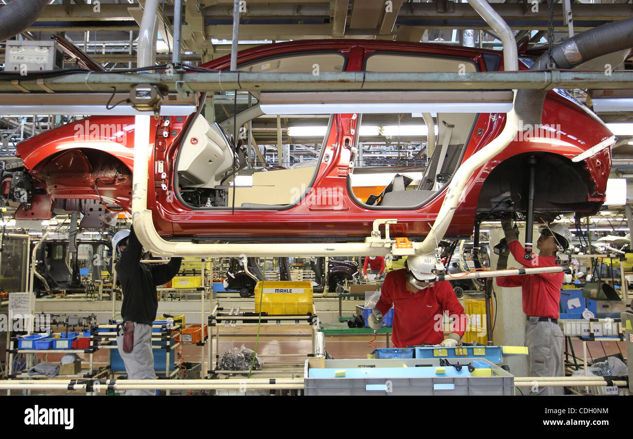 Jan. 24, 2011 - Tokyo, Japan - Employees of Nissan work in the assemble ...