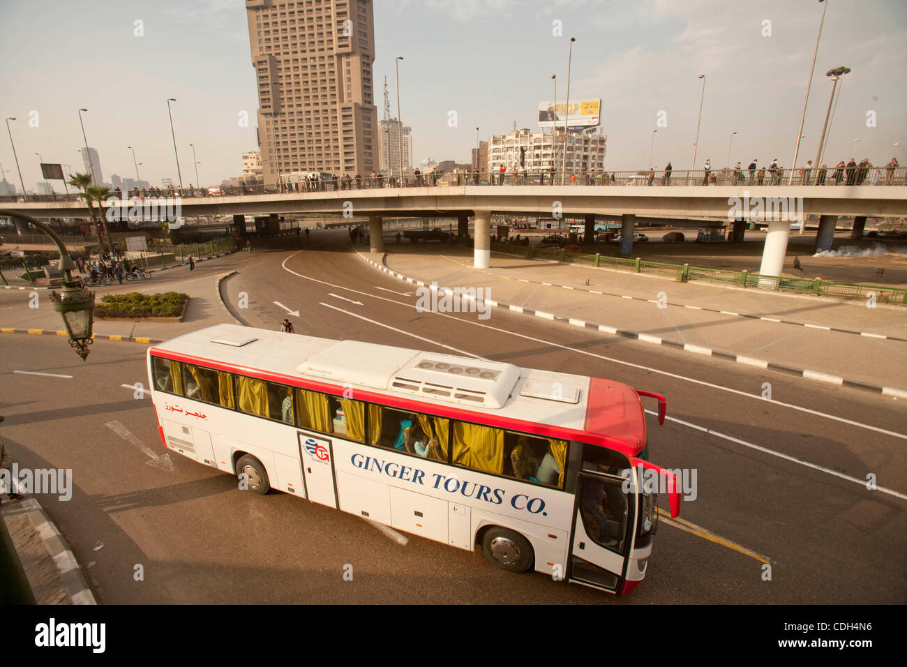 Jan 28, 2011 - Cairo, Egypt - A bus of tourists pass under a bridge ...