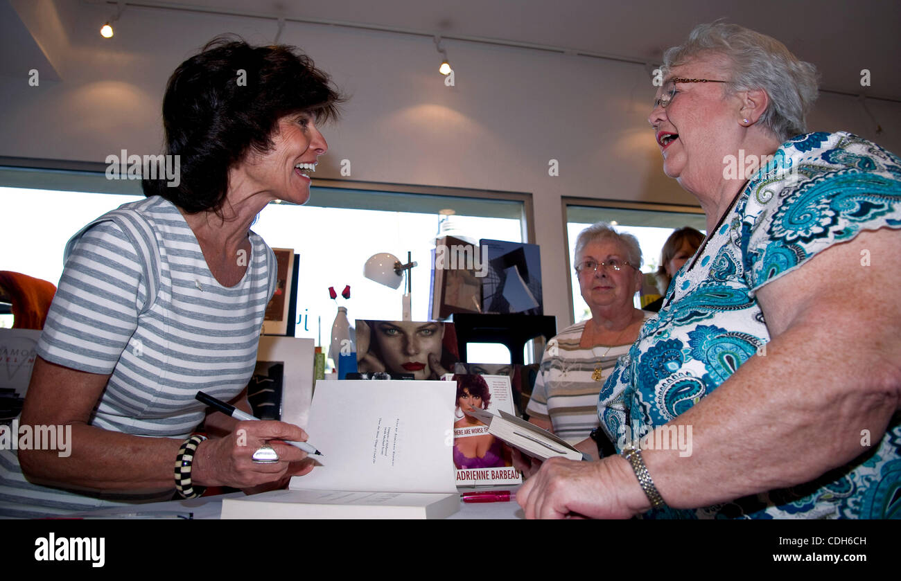 Jan. 29, 2011 - Palm Springs, California, USA - ADRIENNE BARBEAU signs ...