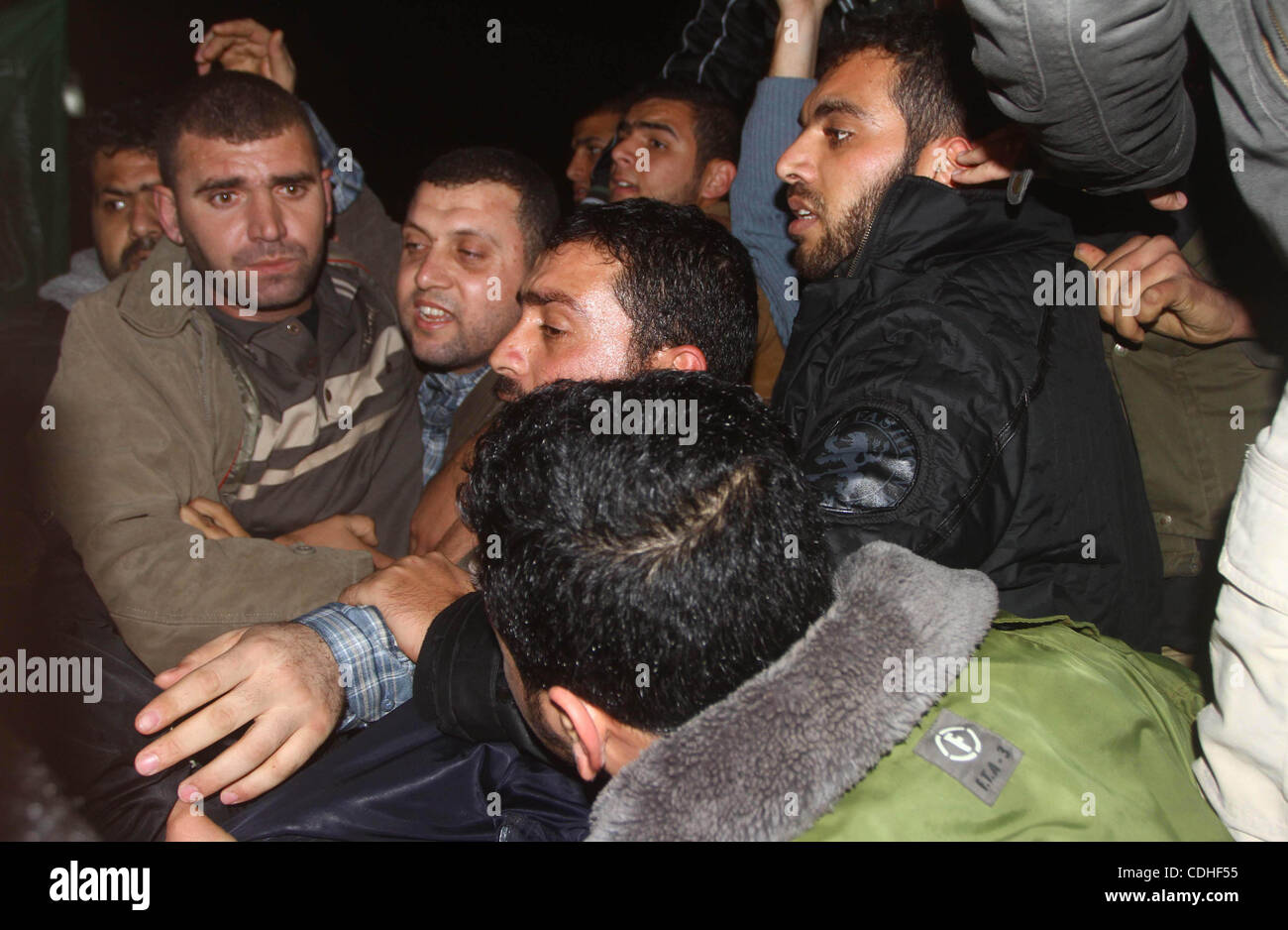 Ayman Nofal , a top Hamas armed commander, is greeted by Hamas ...
