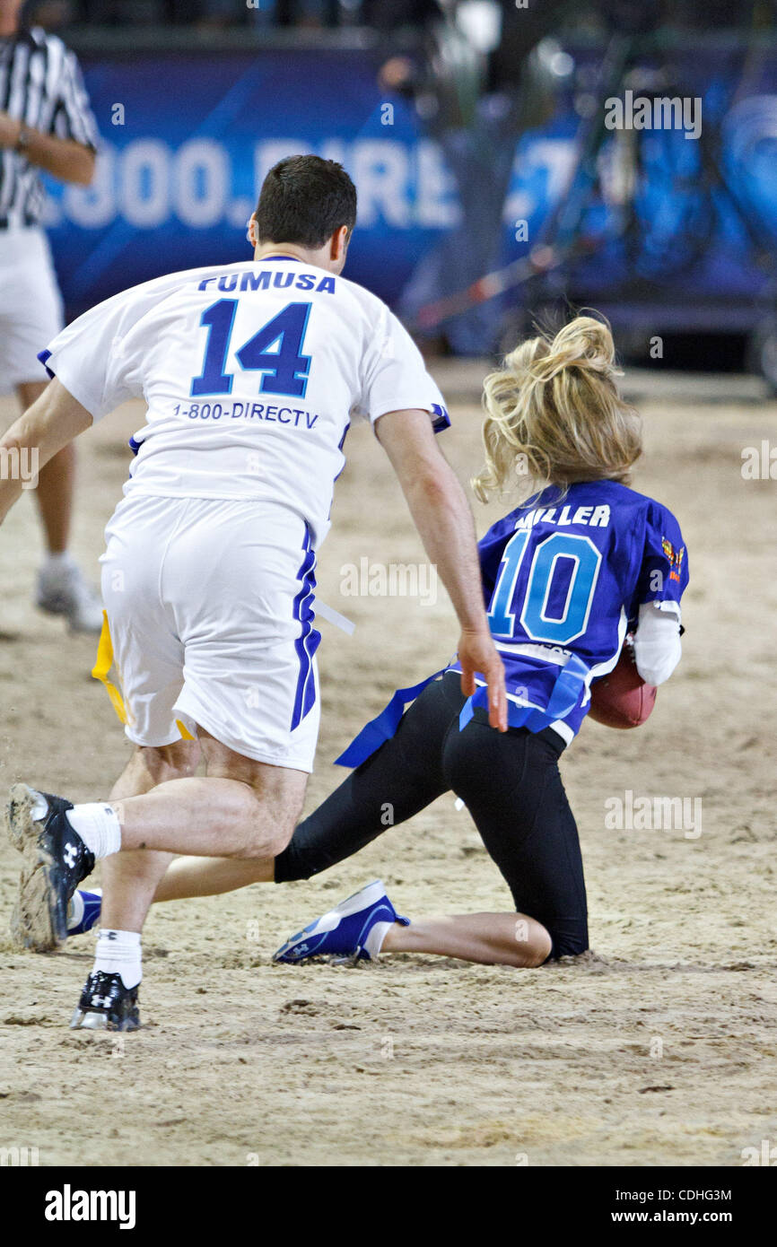 Feb. 5, 2011 - Dallas, Texas, US - Supermodel Marisa Miller dives for a ...
