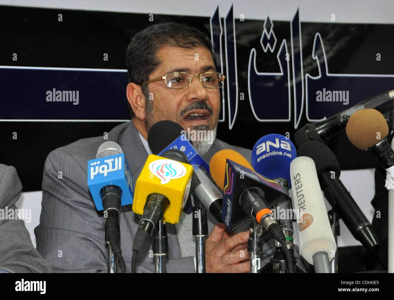 Egyptian Muslim Brotherhood spokesman Mohamed Morsi talks during a ...