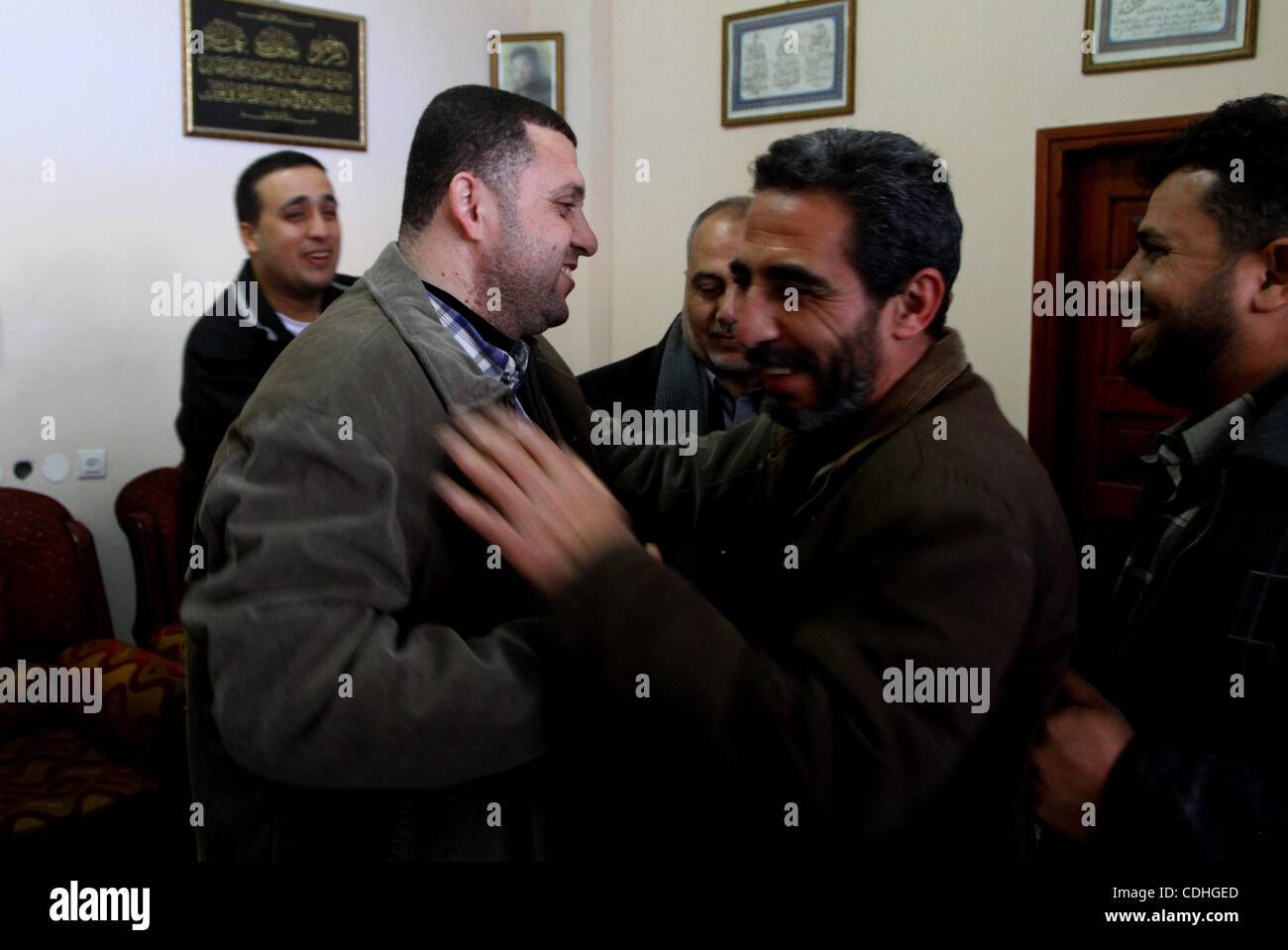 Ayman Nofal , a top Hamas armed commander, is greeted by his relatives ...